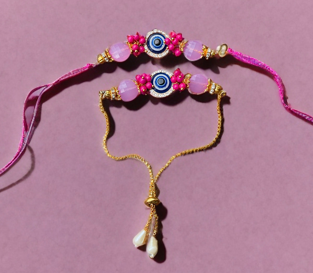 BHAIYA BHABHI EVIL EYE RAKHI (RANI PINK) – UnfoldSelf